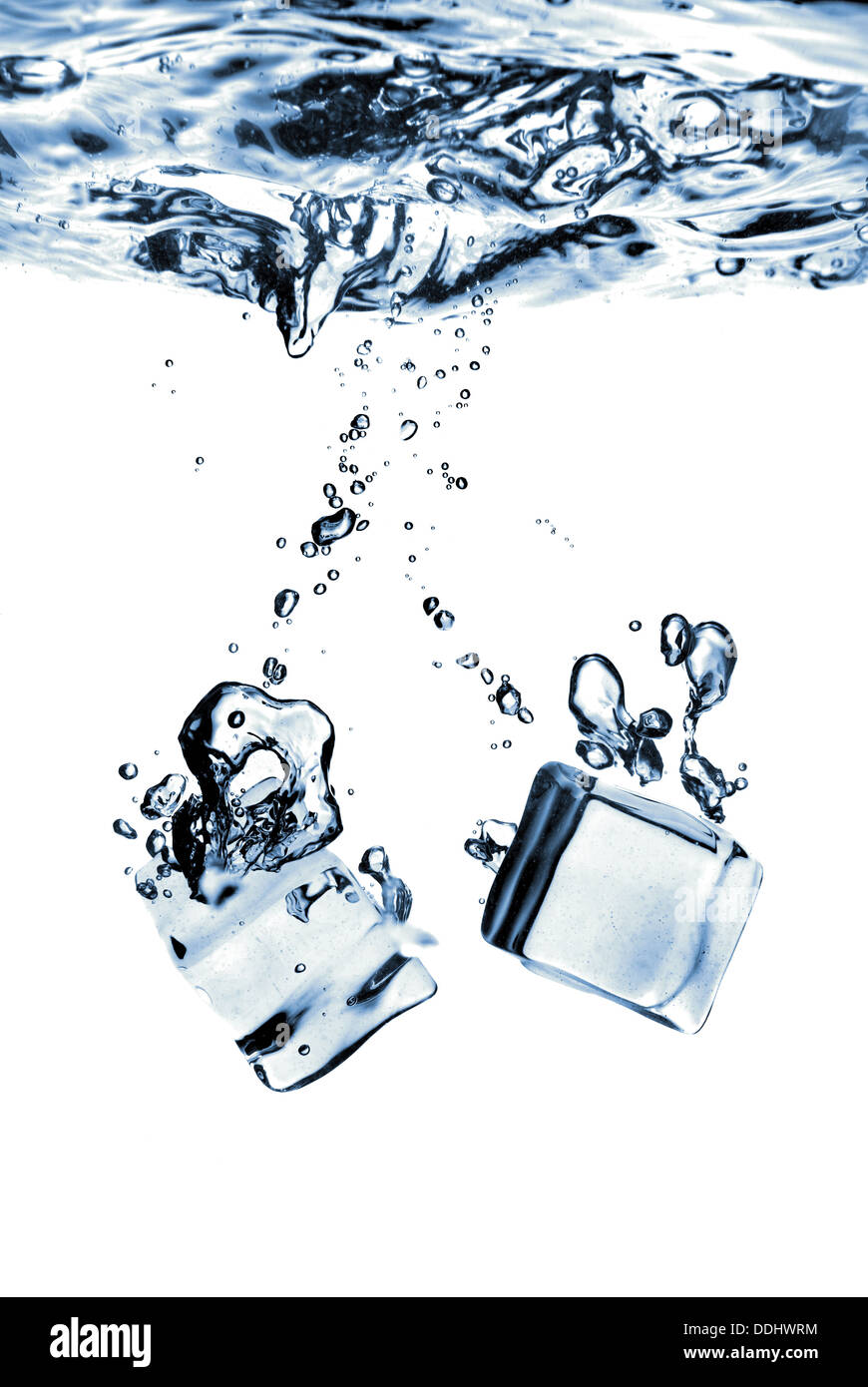 ice cubes dropped into water with splash isolated on white Stock Photo - Alamy