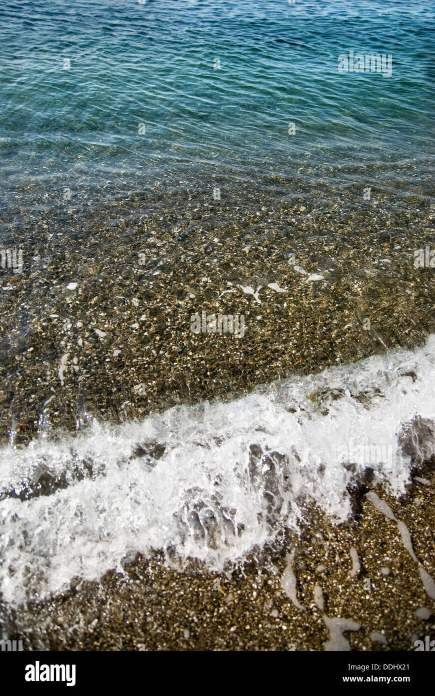 sand stones and water wave Stock Photo - Alamy