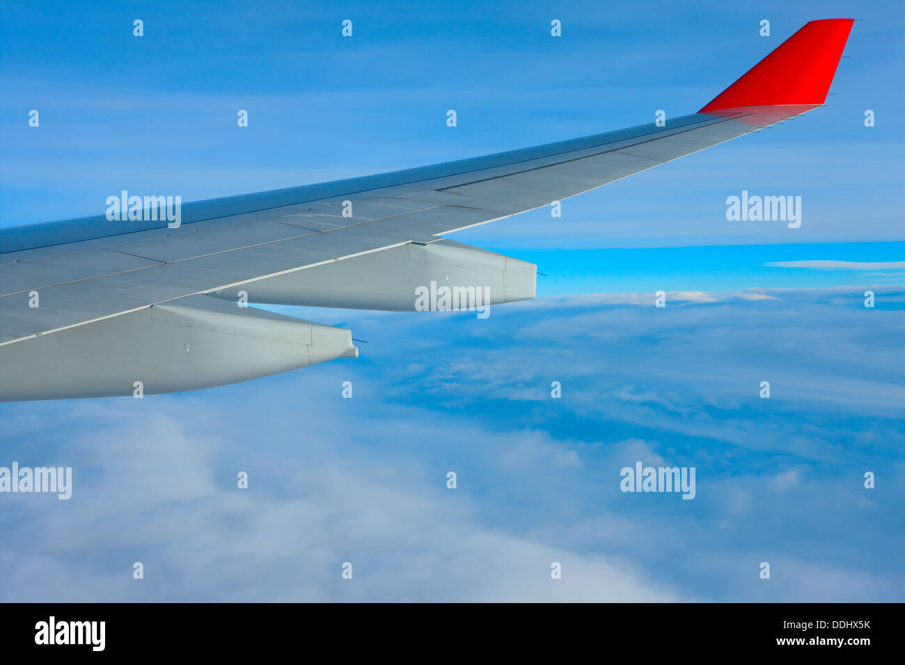 Air travel over the ocean of clouds Stock Photo - Alamy