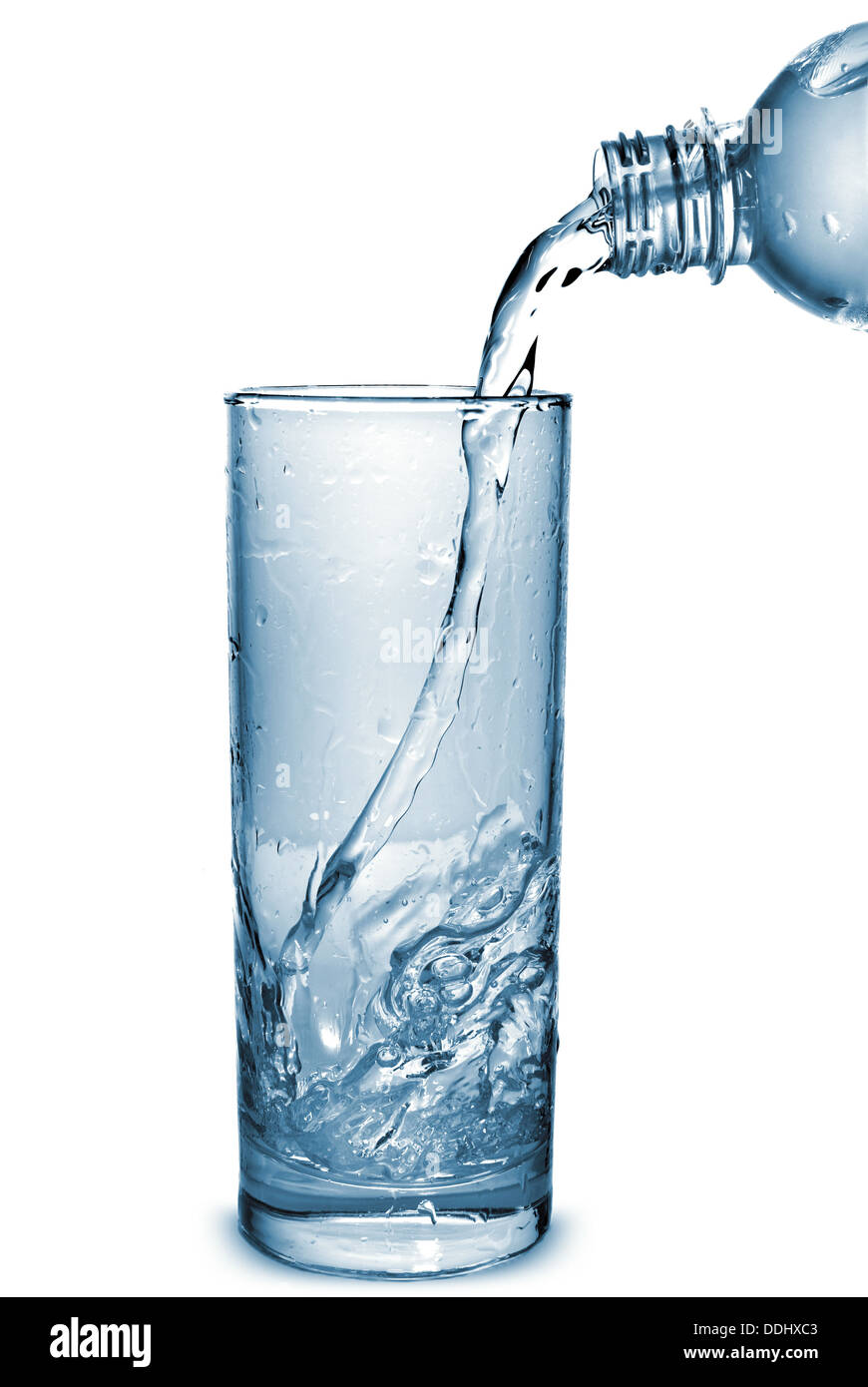 water pouring into glass from bottle isolated on white Stock Photo - Alamy