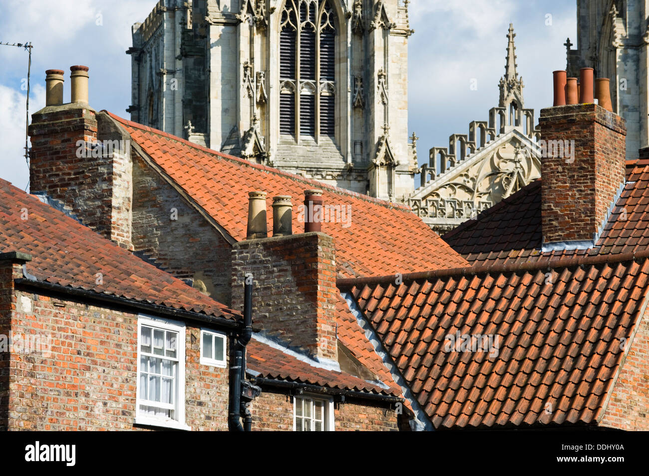View of YORK MINSTER cathedral over rooftops in the city centre of York ...