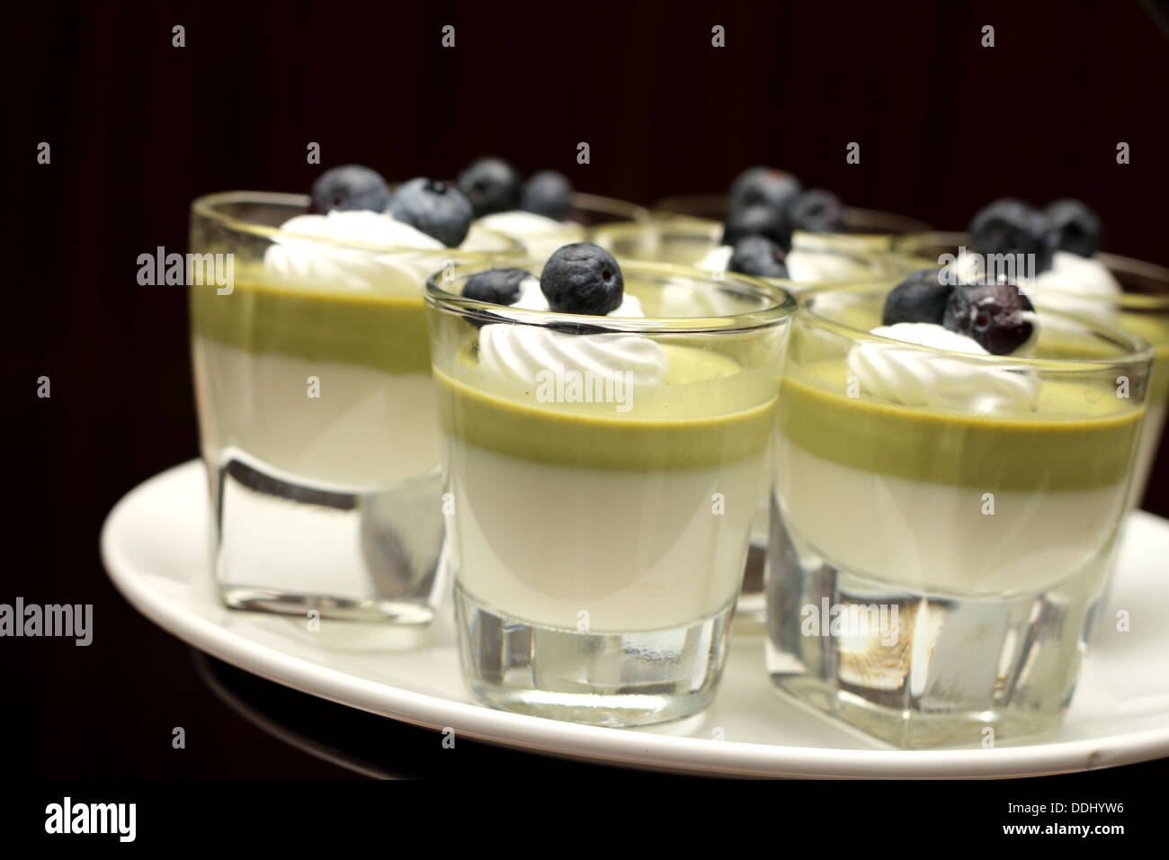 Green tea mousse dessert in a glass cup Stock Photo - Alamy