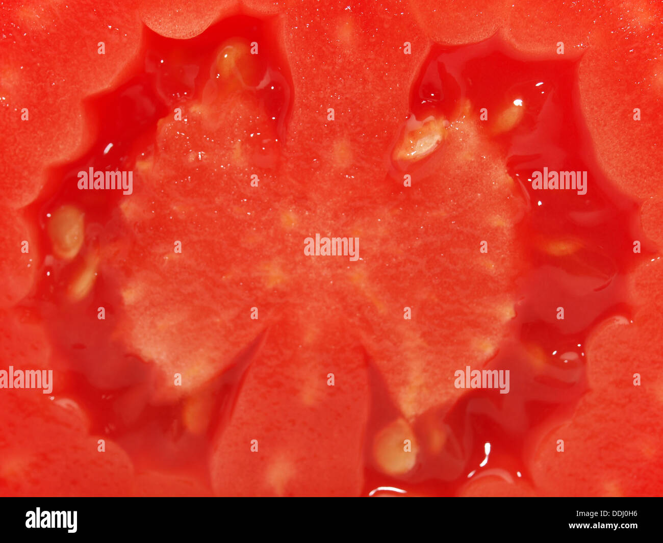 Pulp of a tomato. A background Stock Photo - Alamy