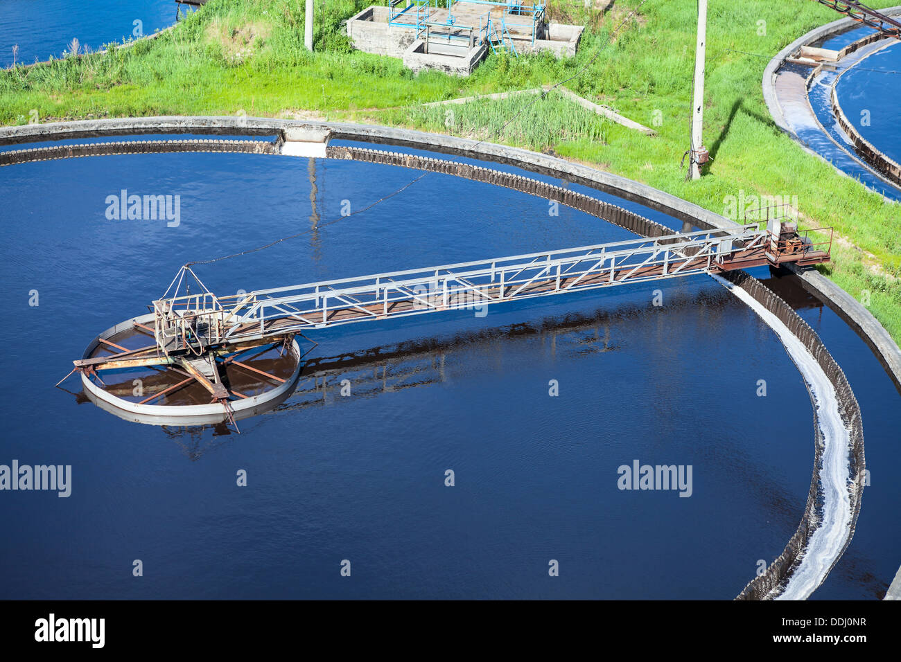 Primary sedimentation basin, sewage flowing through large tanks Stock ...