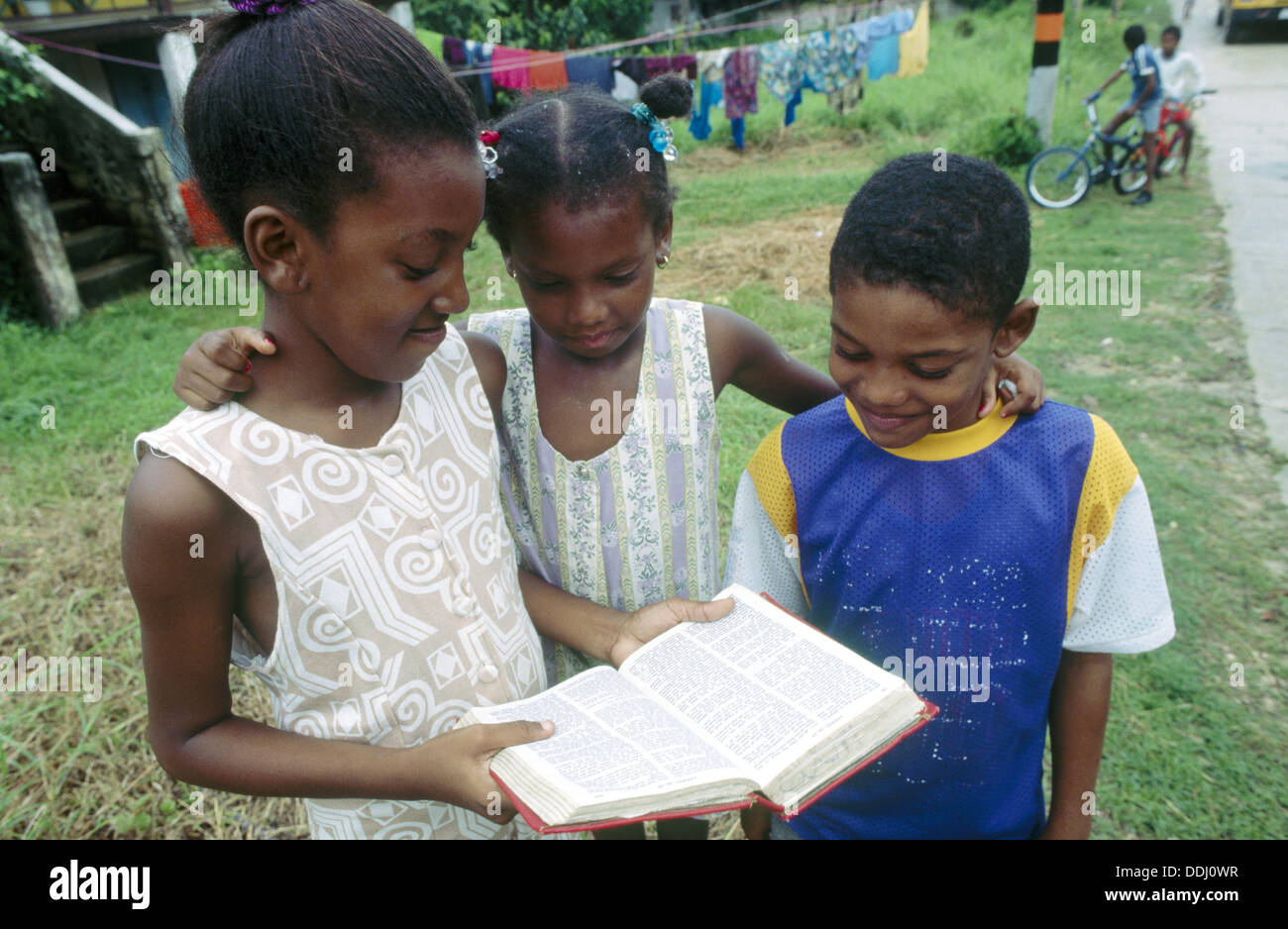 Woman Reading Bible To Child