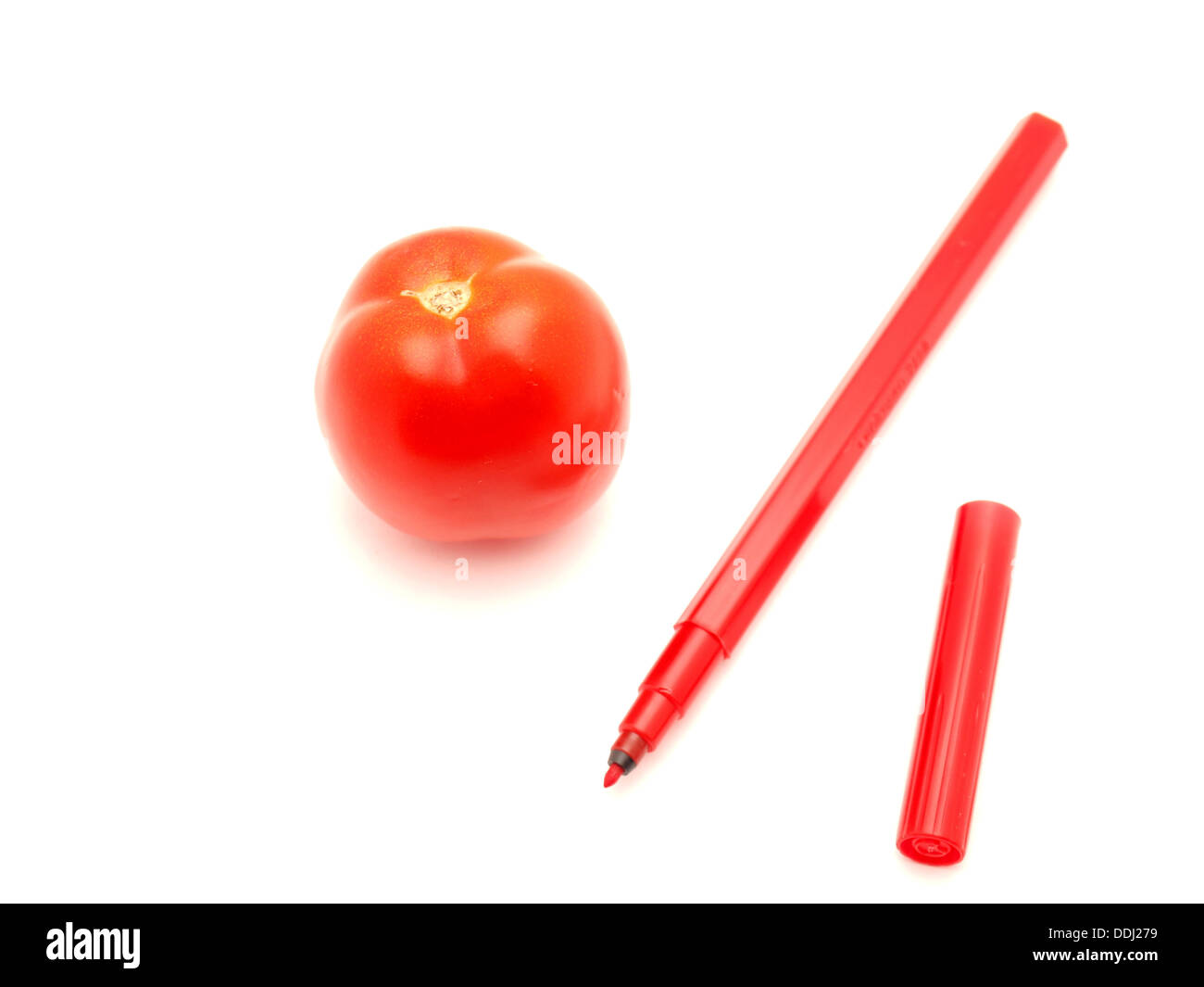 Tomatoes and felt-tip pen on a white background Stock Photo - Alamy