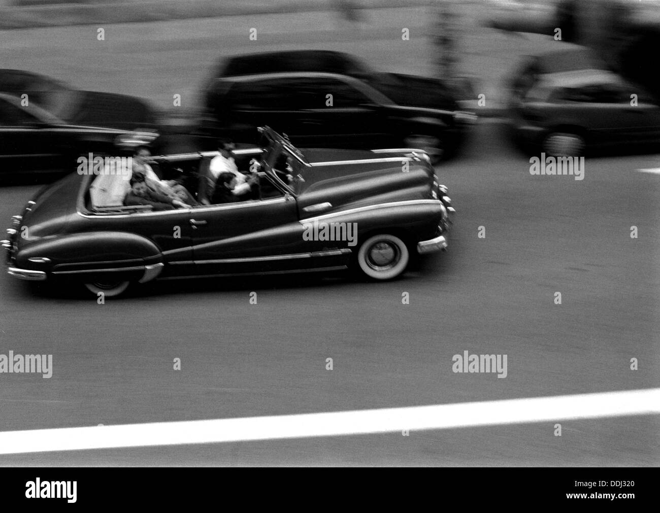Old convertible car moving in black and white Stock Photo - Alamy