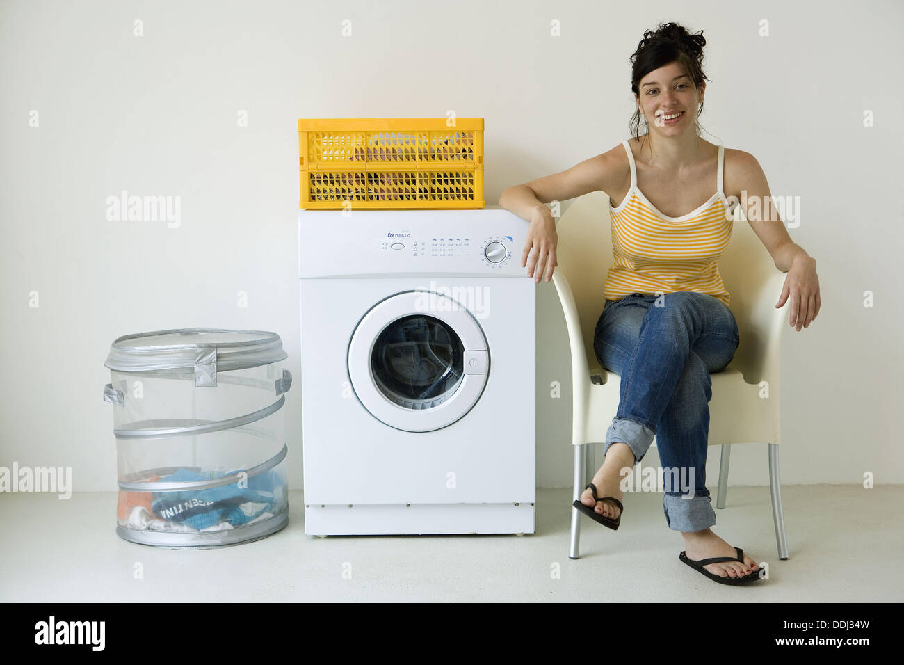 Woman washing machine cross hi-res stock photography and images - Alamy