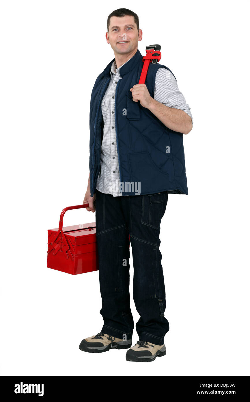 portrait of craftsman against studio background Stock Photo - Alamy