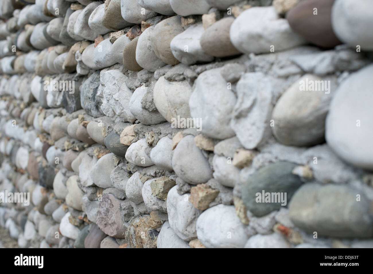 Italy, Construction of house building with pebble stone Stock Photo - Alamy