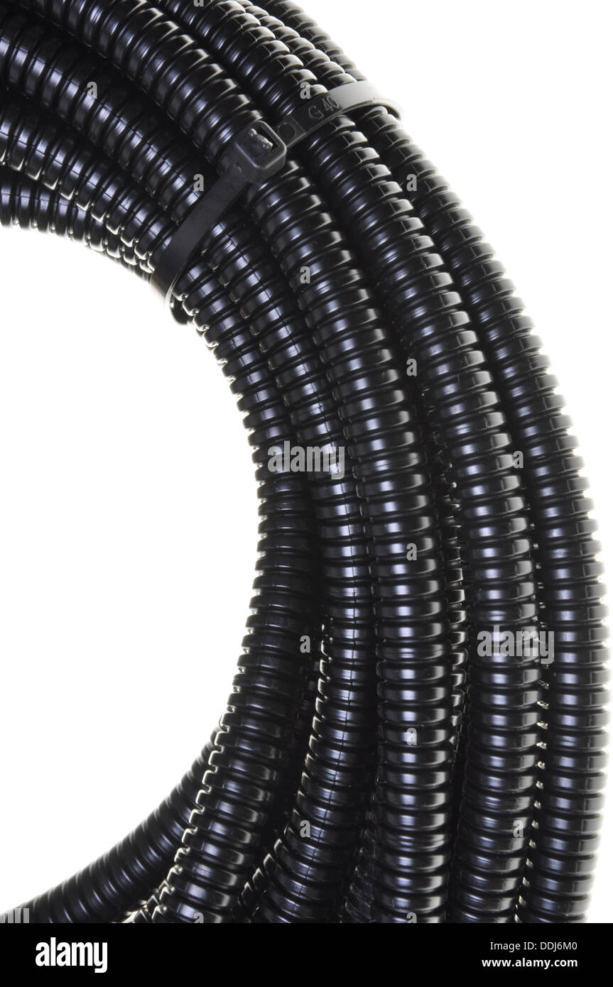 Black plastic corrugated pipe isolated on white background Stock Photo ...