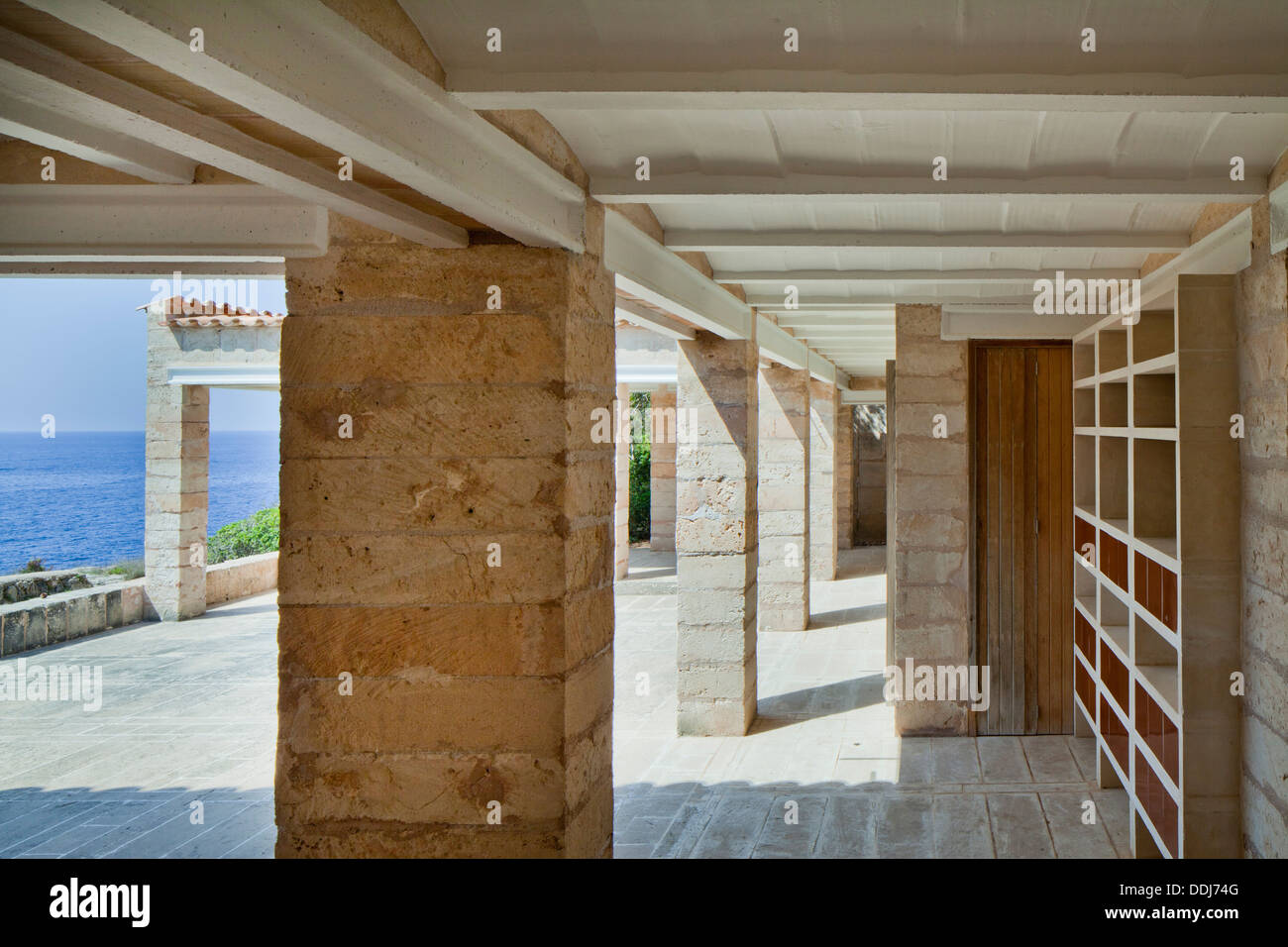Can Lis, Mallorca, Spain. Architect: Utzon, Jorn, 1971. Looking through ...