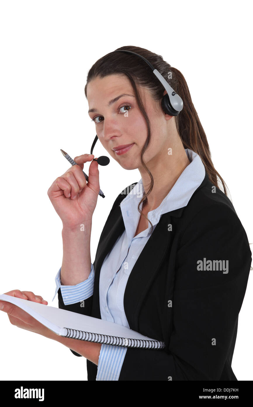 Receptionist with headset Stock Photo - Alamy