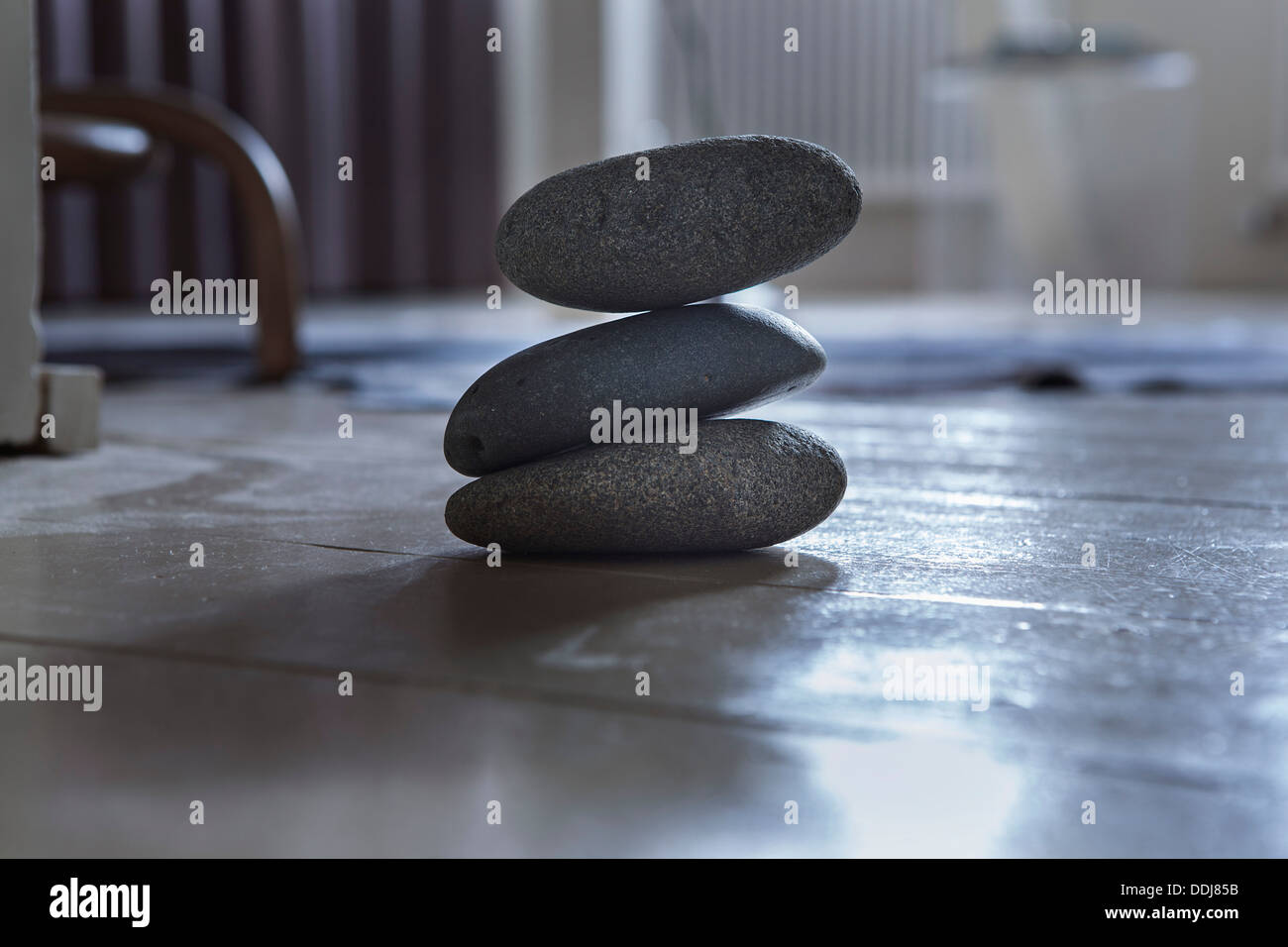 Balanced rocks in house Stock Photo - Alamy