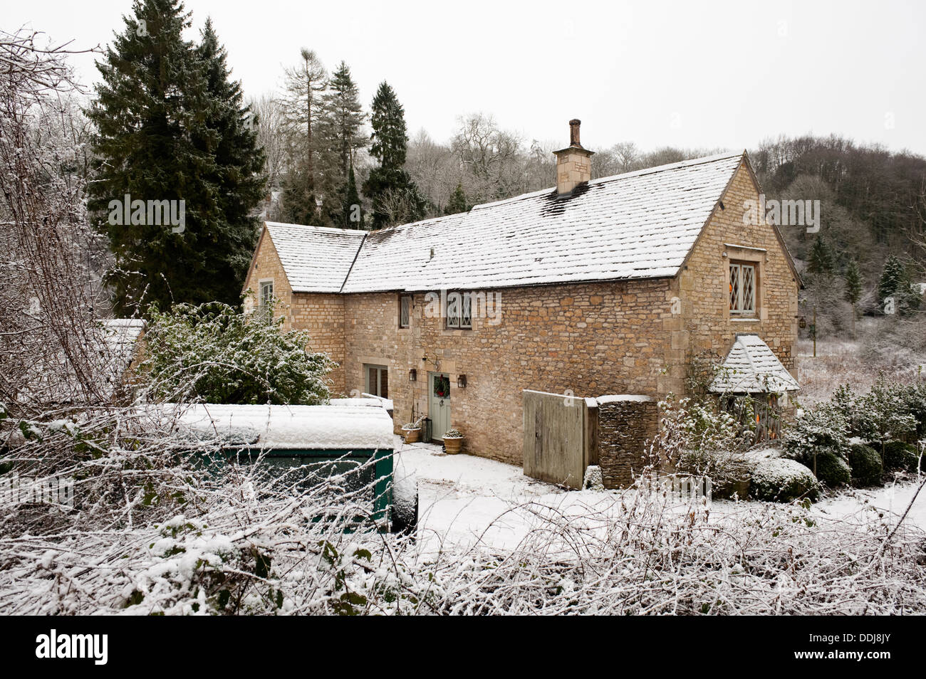 Exterior rear facade of Keepers Cottage accessed by a wooden gate and ...