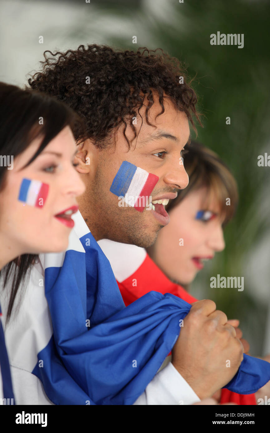 Three French football fans Stock Photo - Alamy