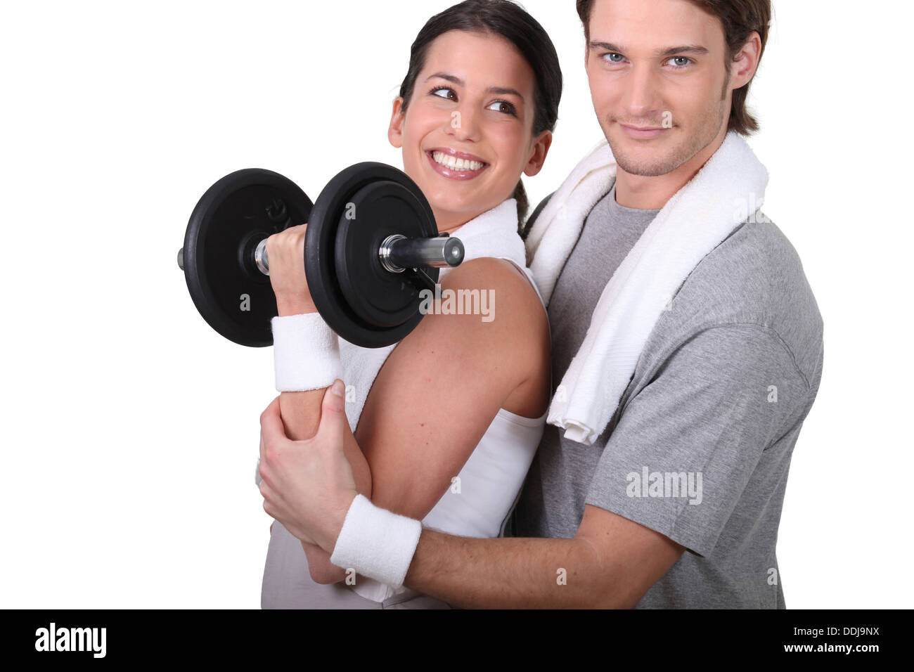 Handsome couple working out biceps hi-res stock photography and images ...