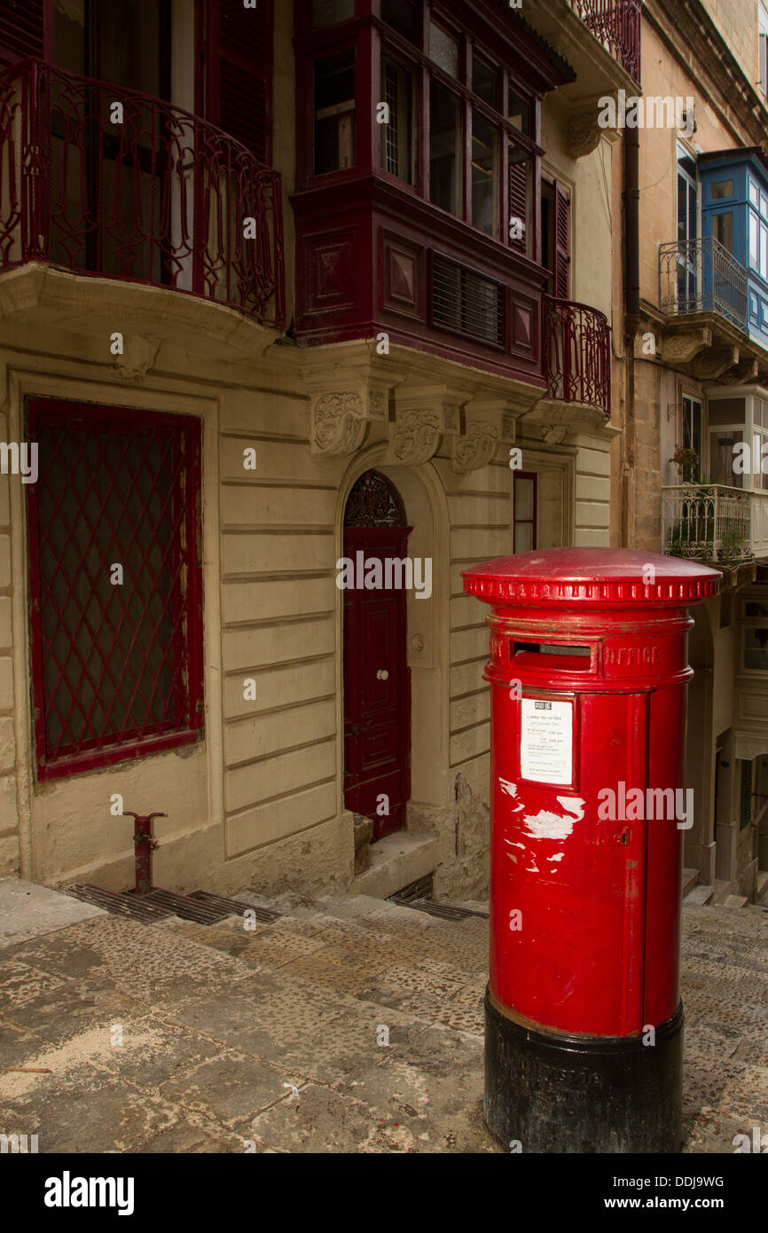 Red mailbox in a street of Valletta, Malta Stock Photo - Alamy