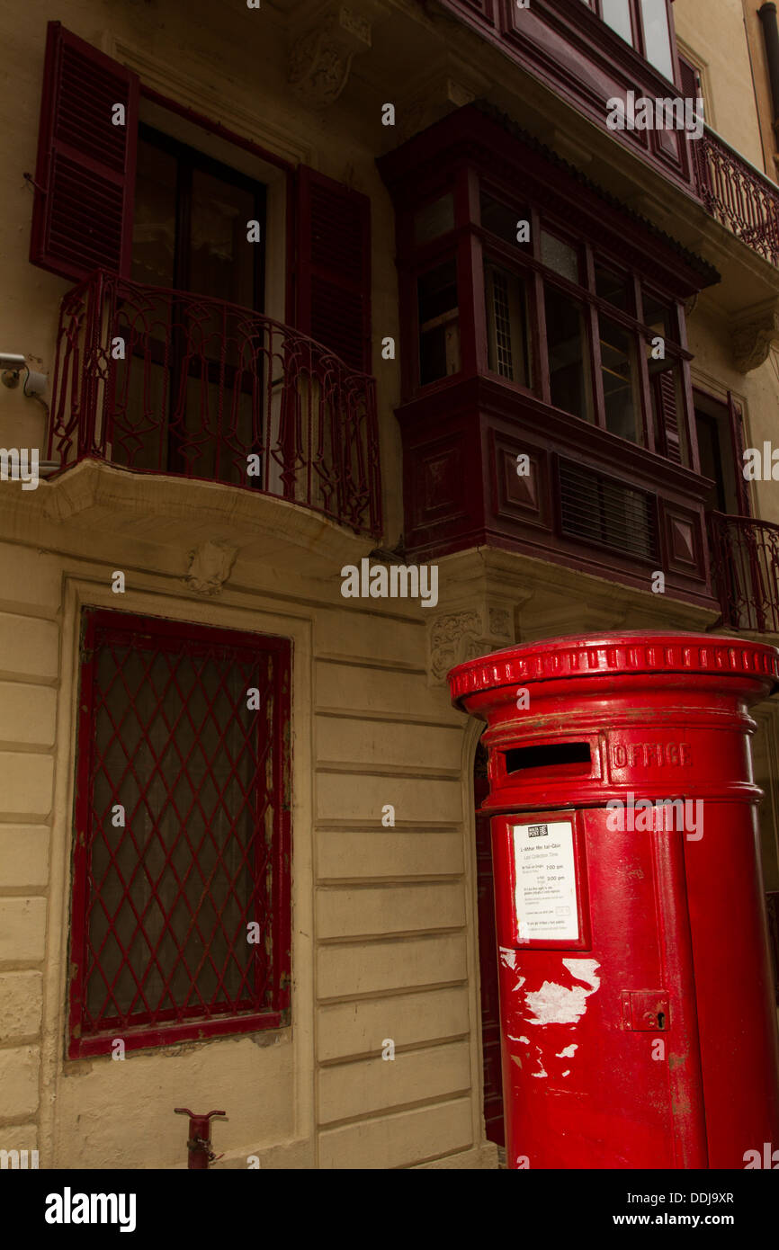 Red mailbox in a street of Valletta, Malta Stock Photo - Alamy
