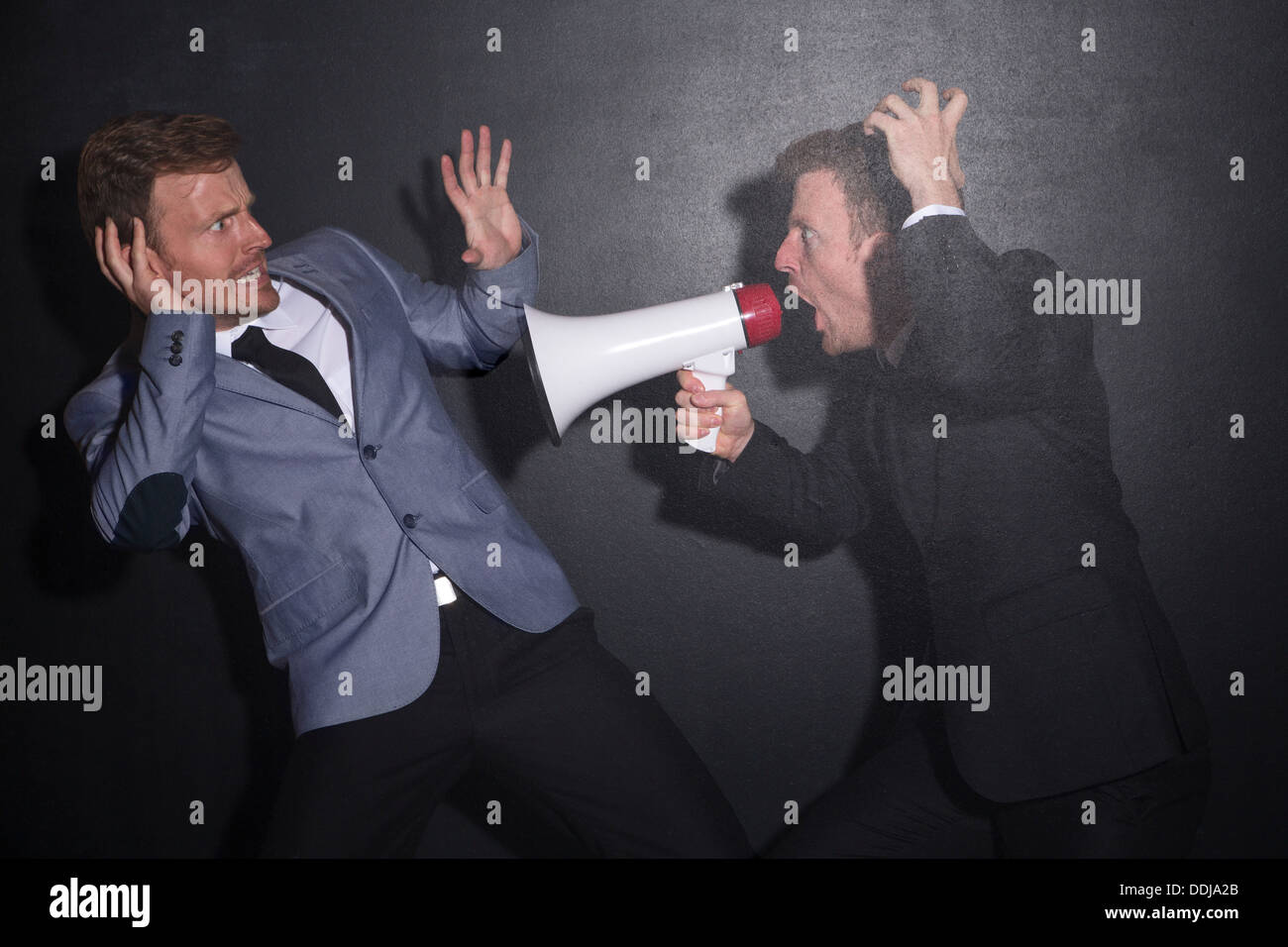 Black man holding megaphone hi-res stock photography and images - Alamy