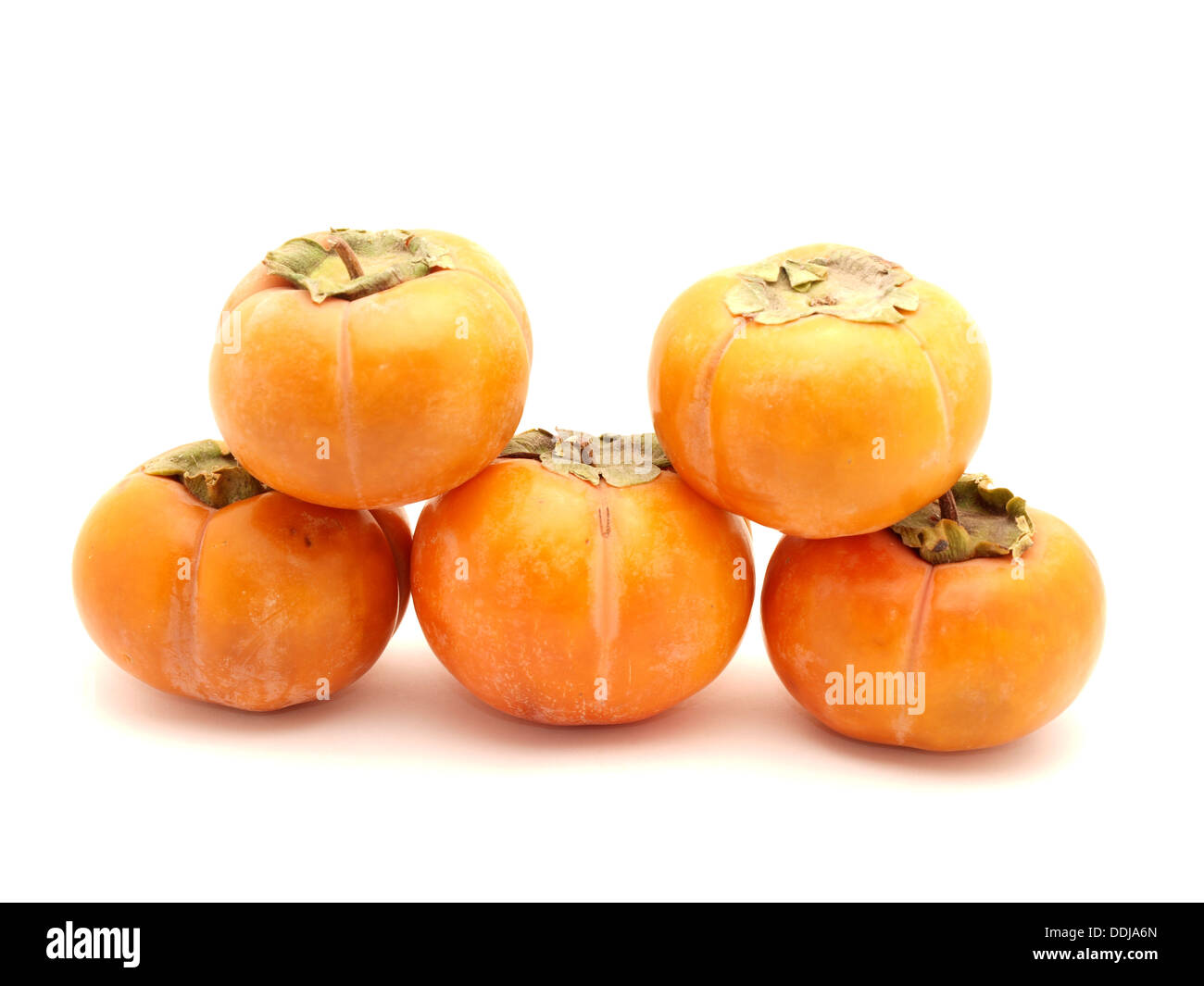 Persimmon on a white background Stock Photo - Alamy