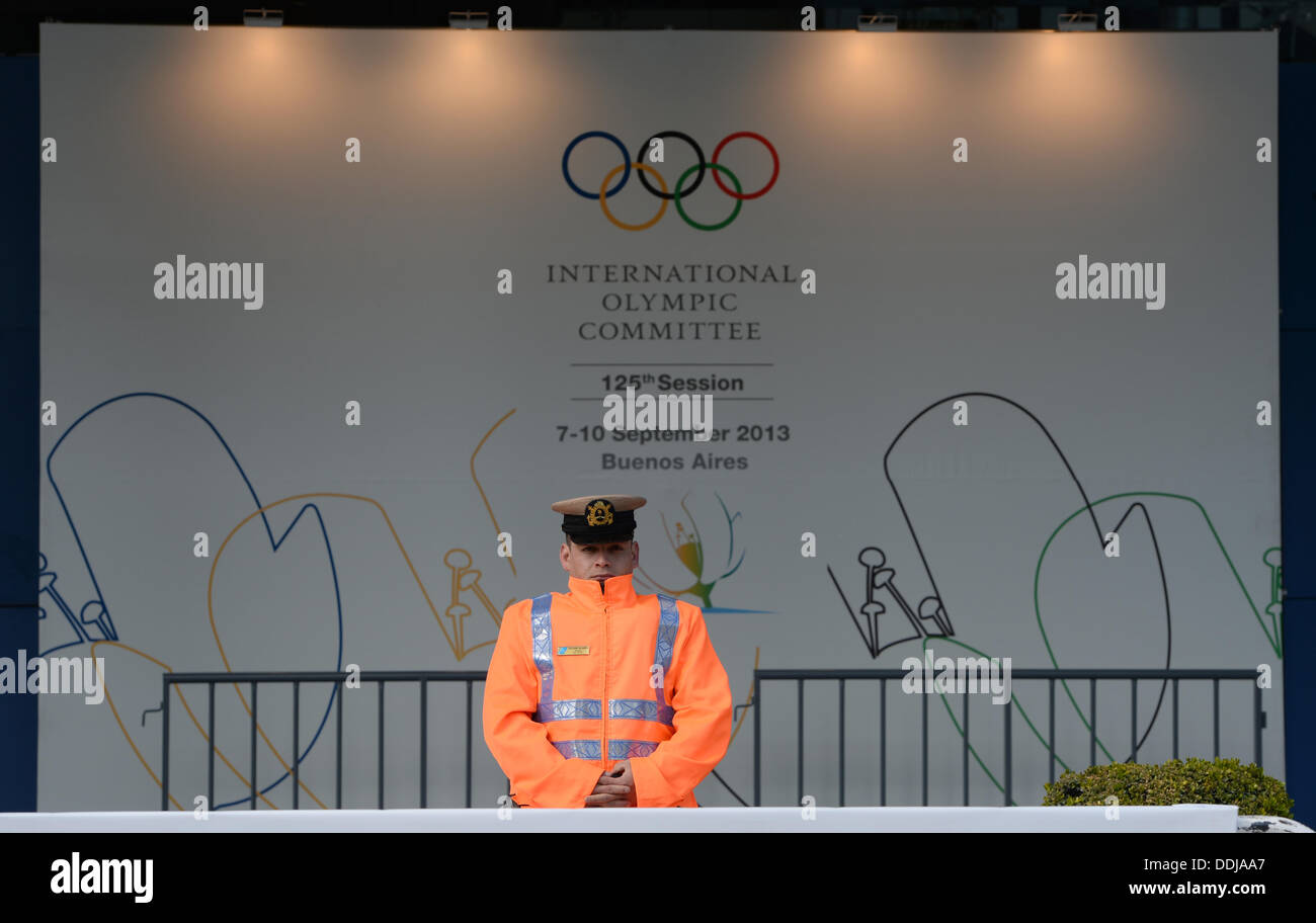 A policeman guards the hotel entrance prior to the 125th Session of the ...