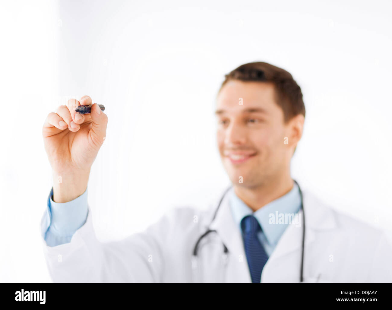 doctor writing something in the air Stock Photo - Alamy