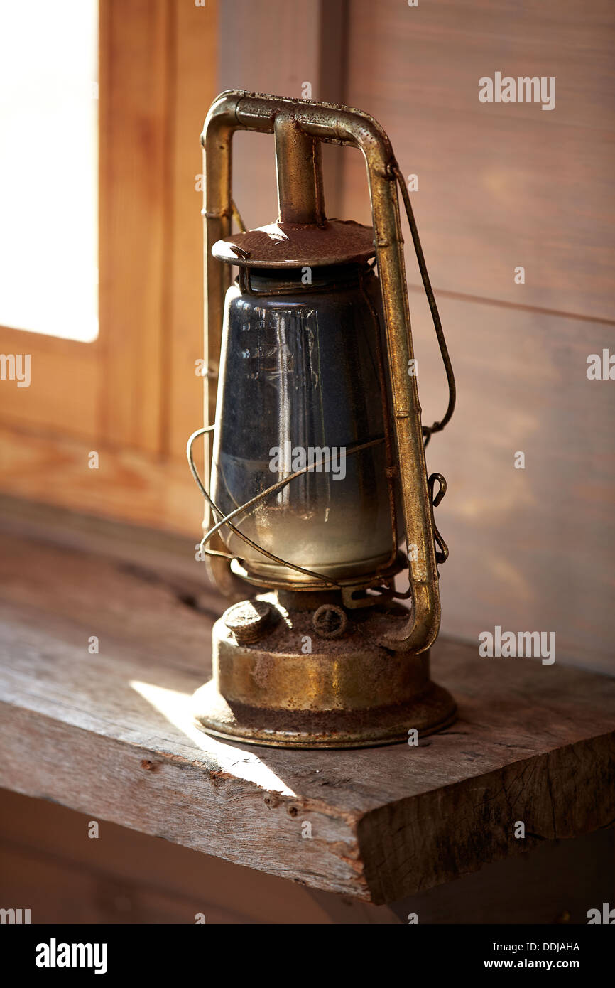 Gas lamp sitting on the window ledge Stock Photo - Alamy