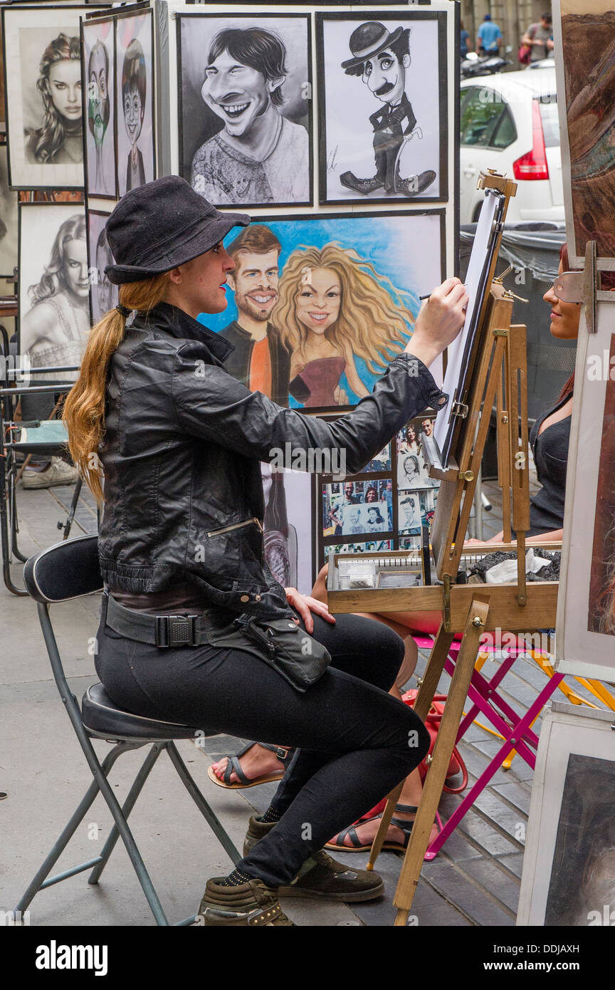 A portrait painter at work in Barcelona Stock Photo - Alamy