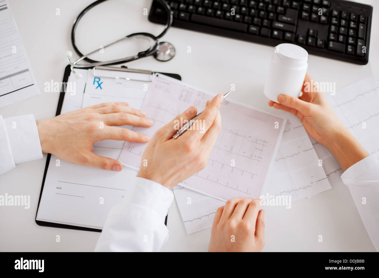 two doctors prescribing medication Stock Photo - Alamy