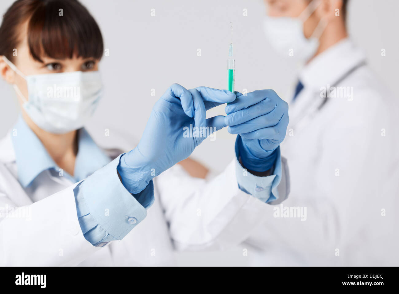 doctors with syringe Stock Photo - Alamy