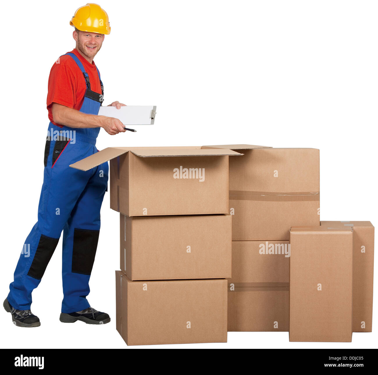 Portrait of mid adult man checking box, smiling Stock Photo - Alamy