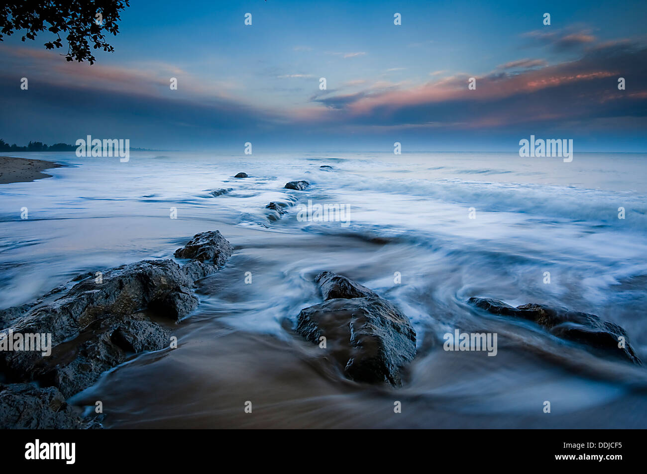 Rock and Sand at Bekenu Beach Stock Photo - Alamy