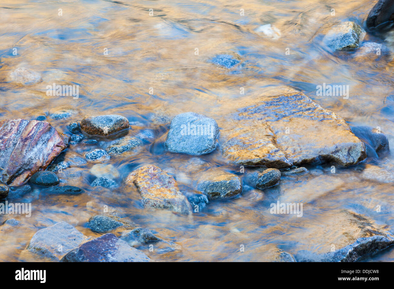 Rocks in a river Stock Photo - Alamy