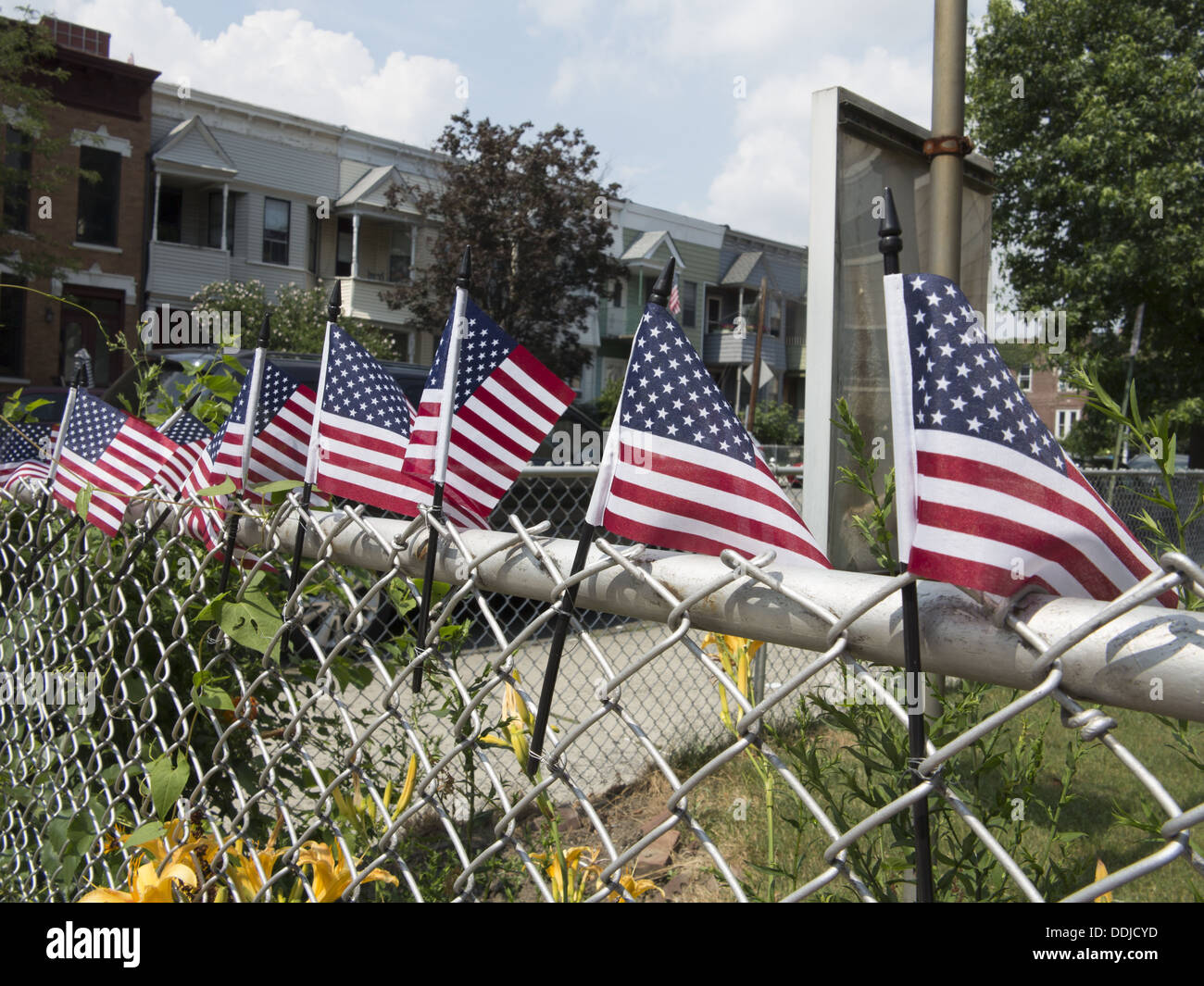 American flags fence patriotic hi-res stock photography and images - Alamy