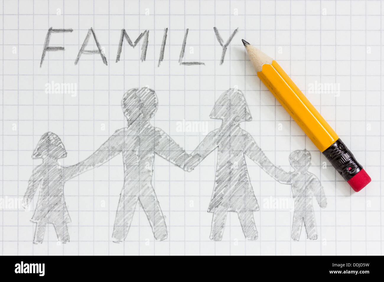 Pencil on the drawing of happy family Stock Photo - Alamy