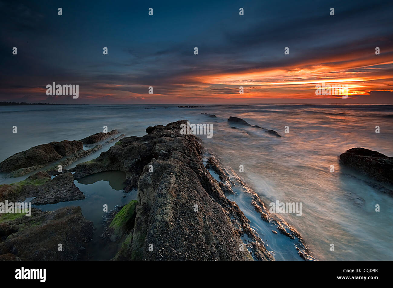 Sunset at Miri Beach Stock Photo - Alamy