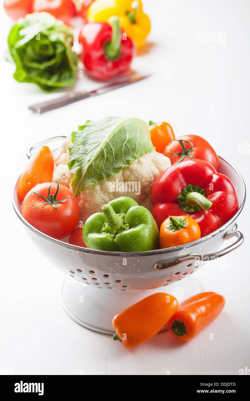 colorful vegetables in colander Stock Photo - Alamy