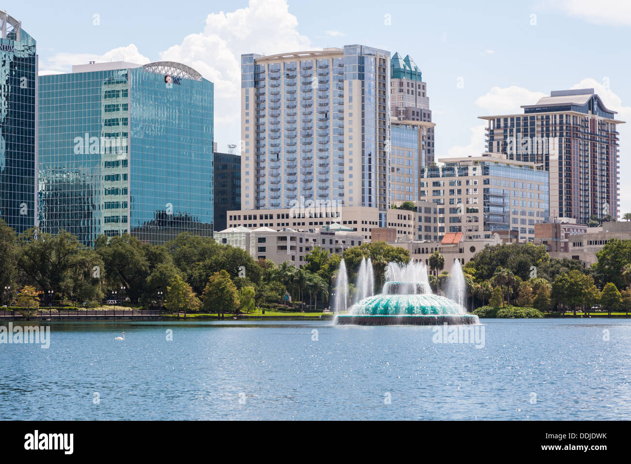 High rise buildings behind the fountain at Lake Eola in downtown ...