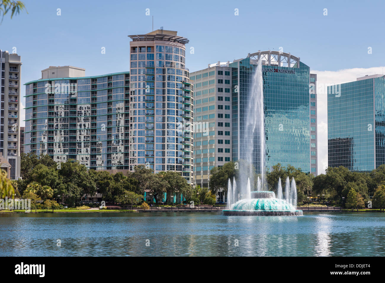 High rise buildings behind the fountain at Lake Eola in downtown ...