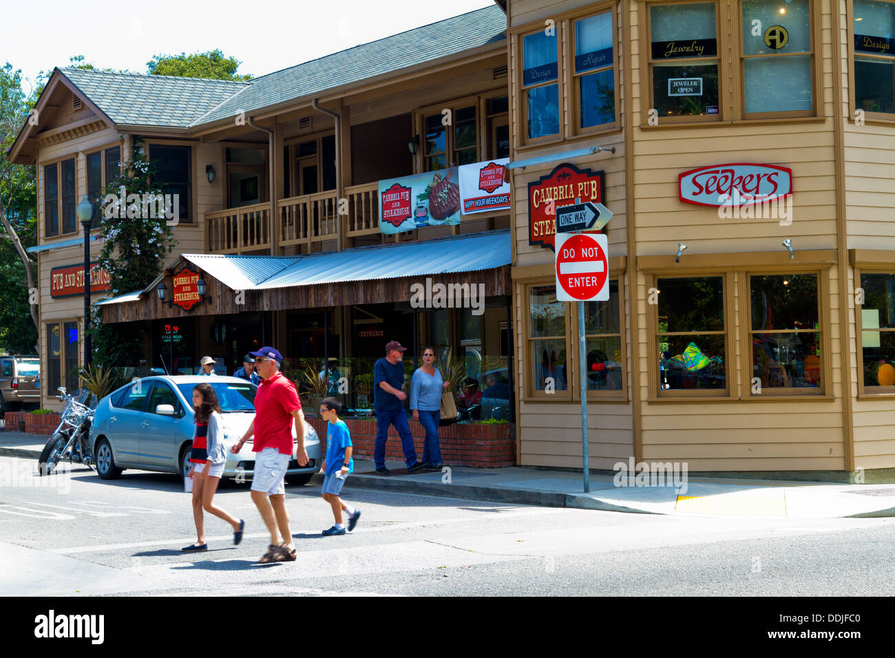 Tourist strolling and sightseeing on the streets of Cambria, California ...