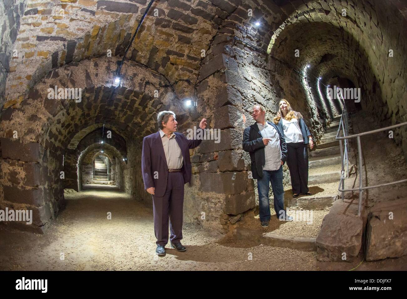 Visitors walk through the casemates of Friedenstein castle in Gotha ...