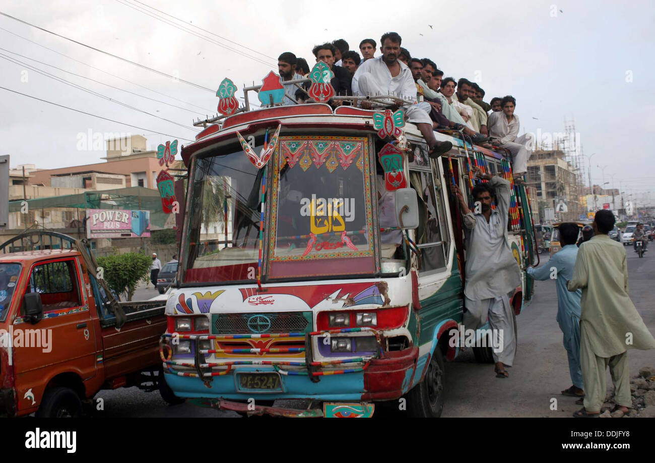 Karachi, Pakistan. 03rd Sep, 2013. Passengers traveling on an ...