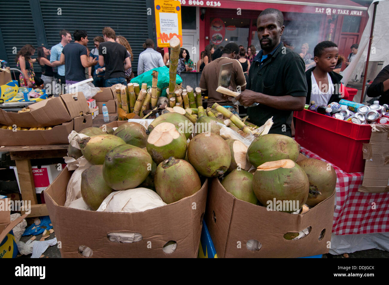 Stall selling coconuts at Carnival time in notting Hill West London ...