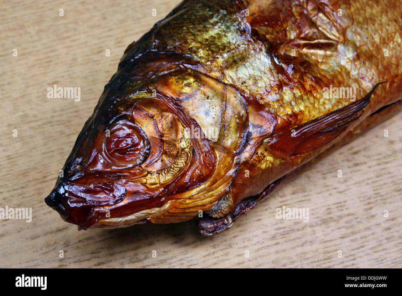 Fresh smoked fish head whitefish Stock Photo - Alamy