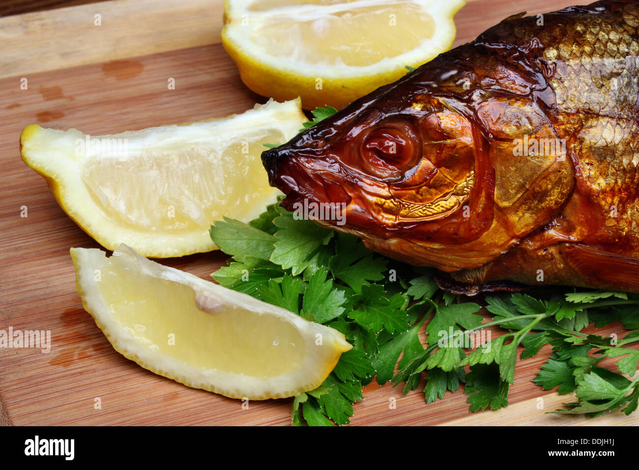 Fish smoked whitefish on a chopping board Stock Photo - Alamy