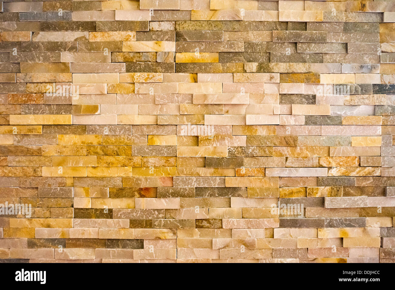 irregular, yellow, brick background. big image Stock Photo - Alamy