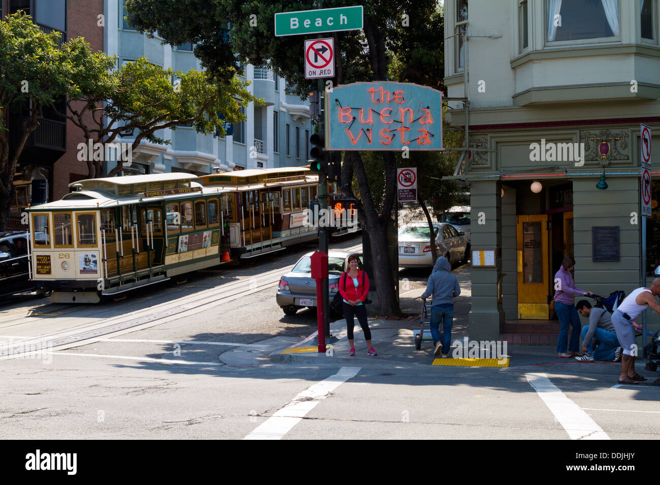 San Francisco street scene showing The Buena Vista café and cable cars ...