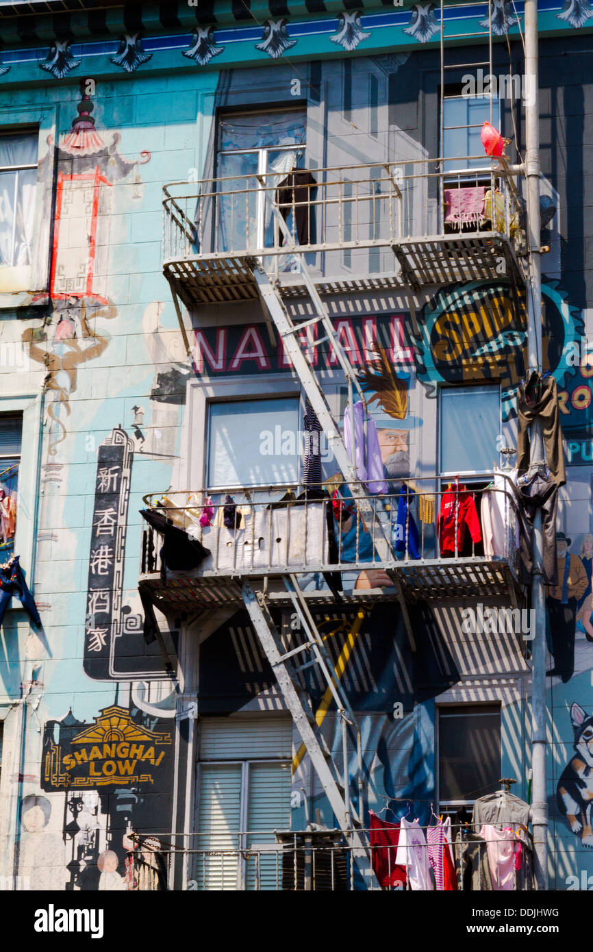 Bizarre shop in San Francisco Chinatown displaying wares on fire escape ...