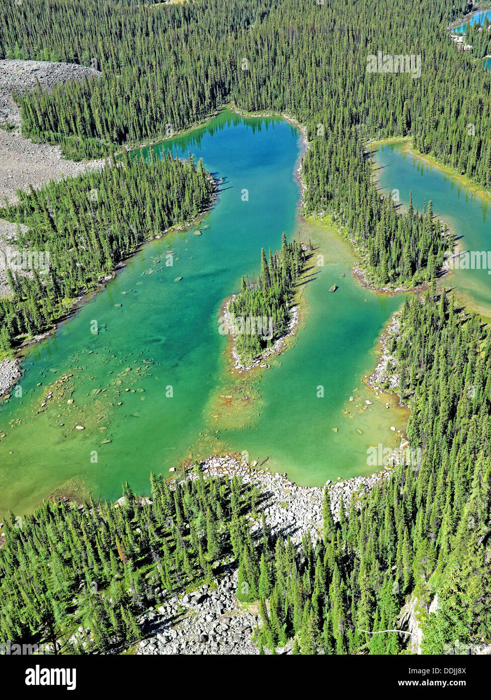 Mountains reflected in a clear calm alpine lake Stock Photo - Alamy